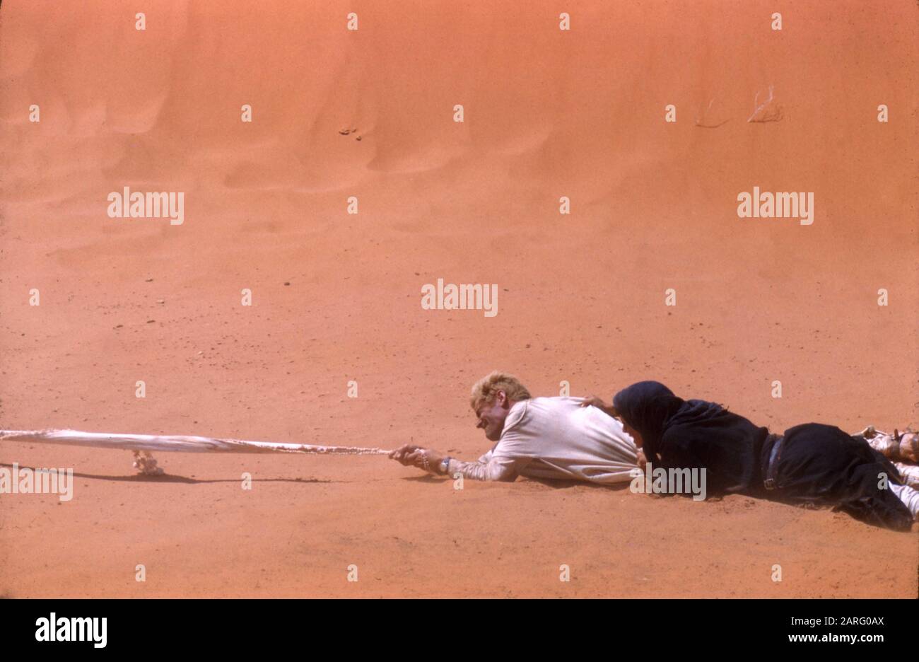 PETER O'TOOLE as T.E. Lawrence and MICHEL RAY as Farraj in LAWRENCE OF ...