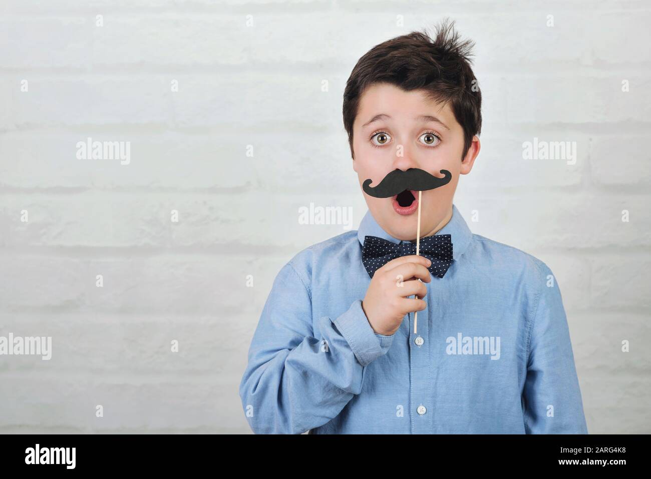 Fake smile boy hi-res stock photography and images - Alamy