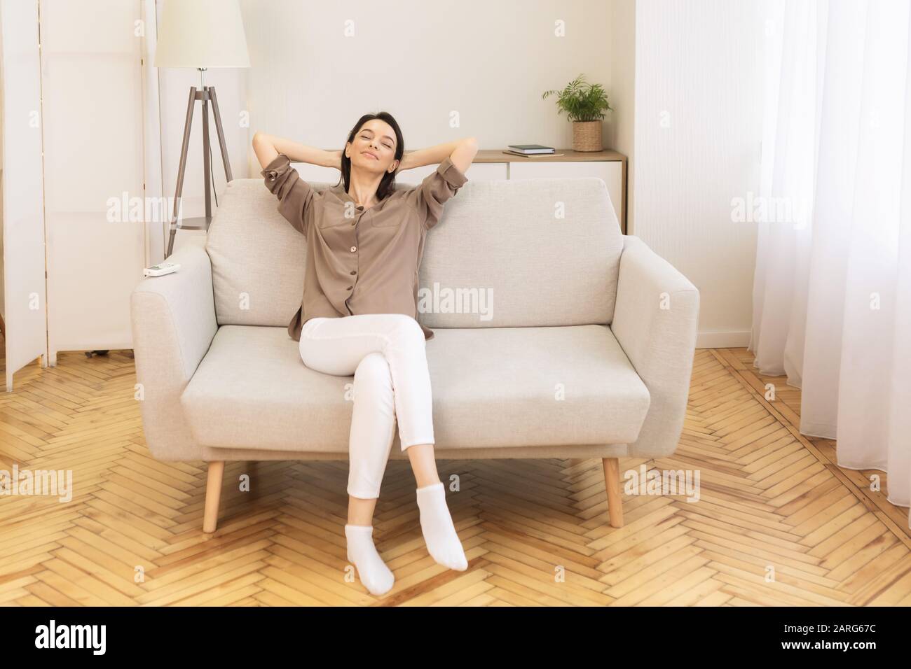 Girl having rest at home on the weekend Stock Photo - Alamy
