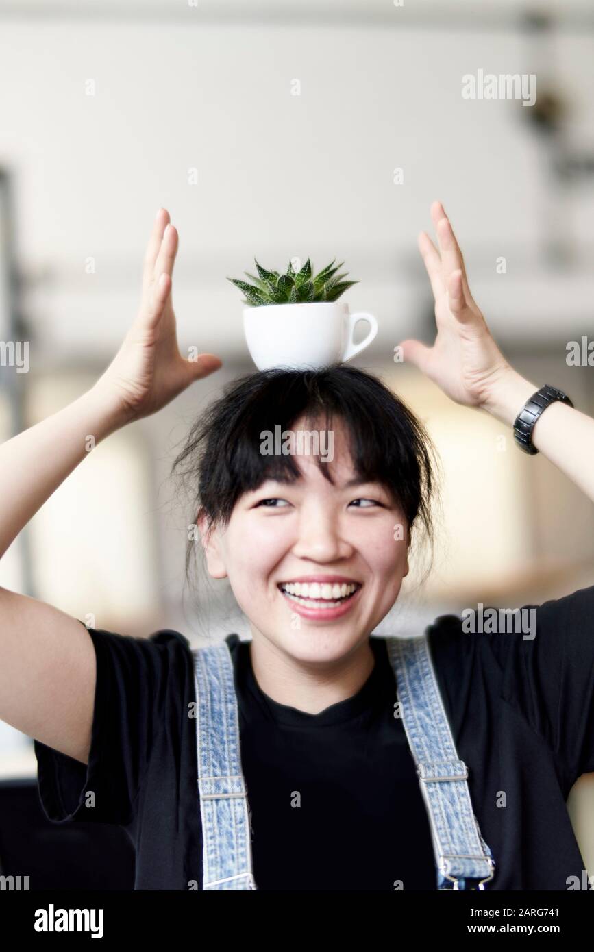 Balancing pot on head hi-res stock photography and images - Alamy