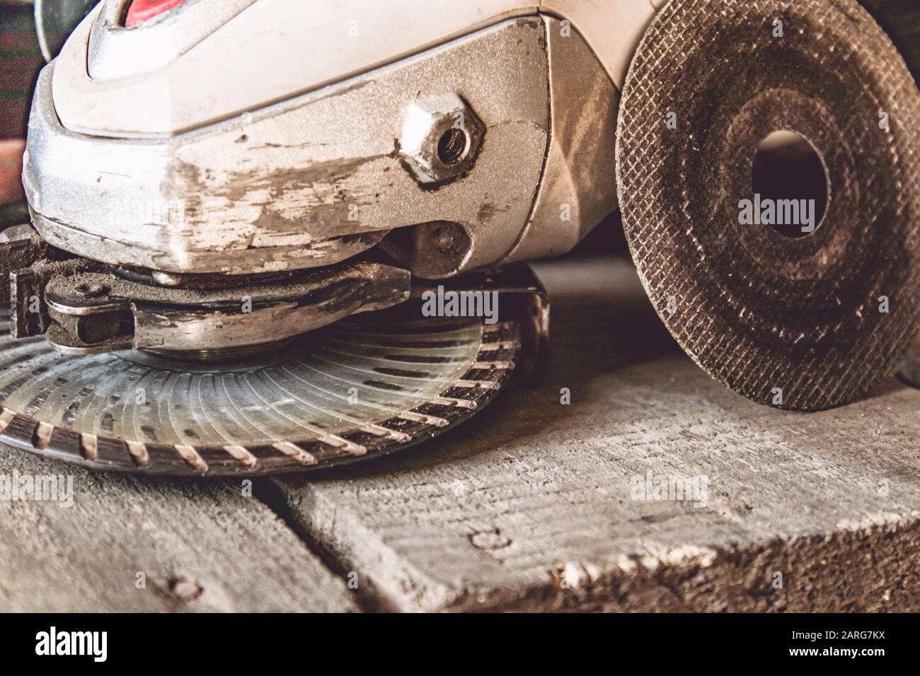 Electric cutting and grinding machine. Angle grinder with abrasive disc ...