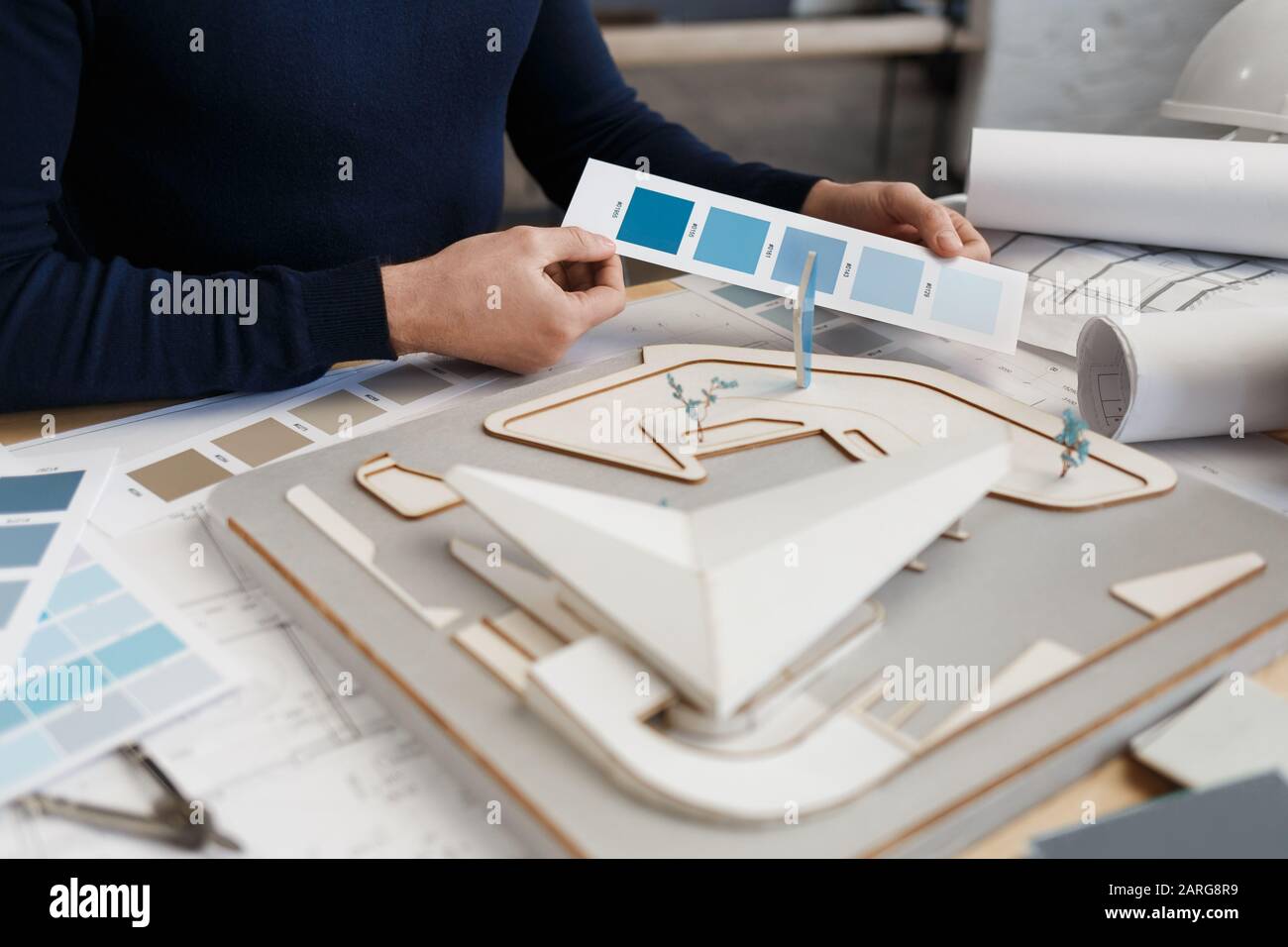 Architect working in office with color palette. Engineer select colors ...