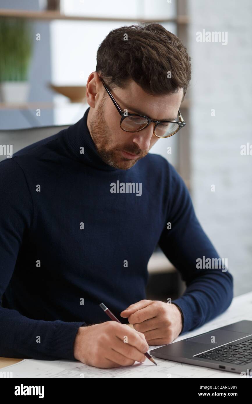 Architect Working In Office With Blueprintsengineer Inspect Architectural Plan Sketching A