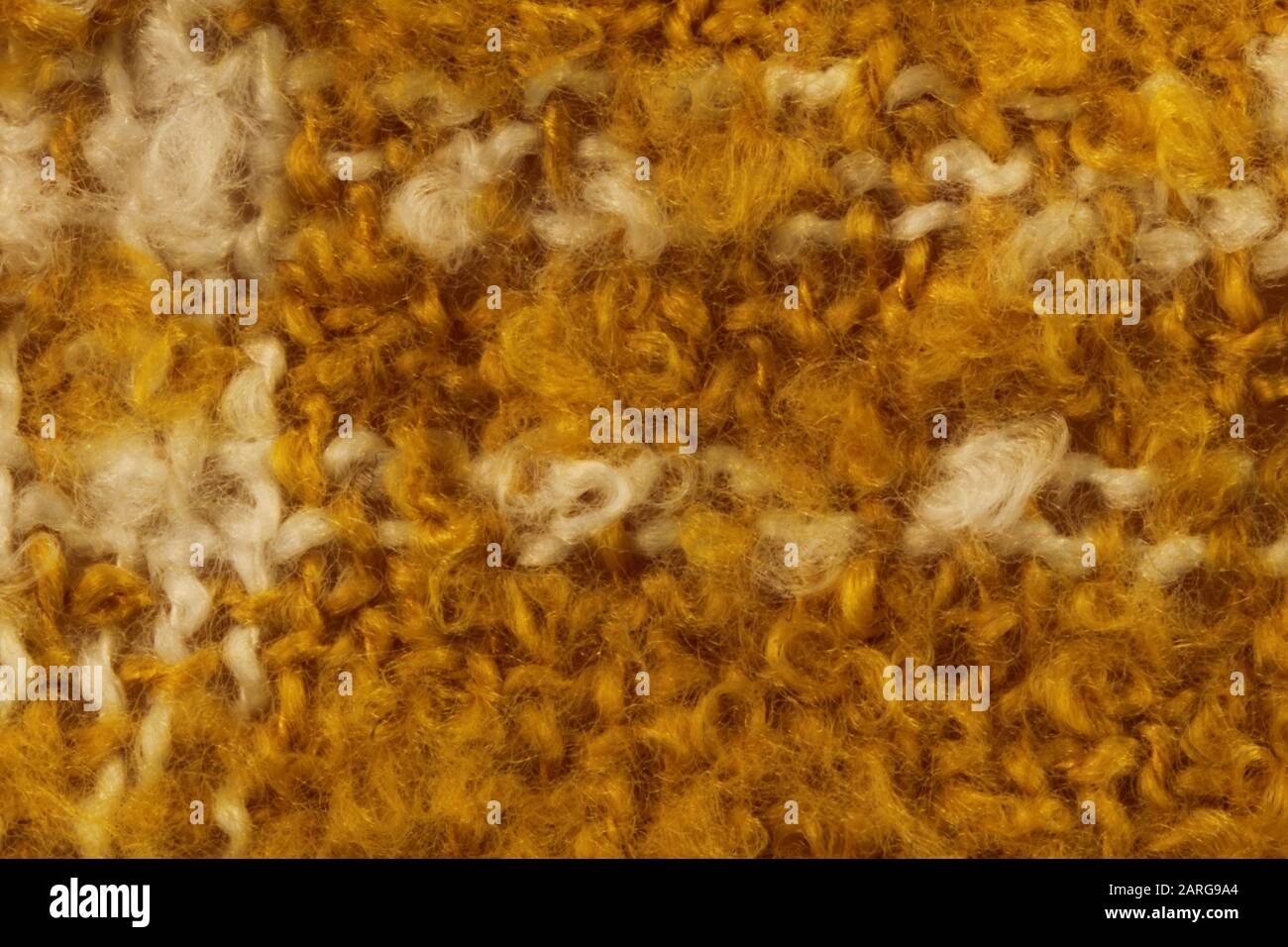 Close-Up Image of Gold Yellow Knit Fabric Texture Stock Photo - Alamy