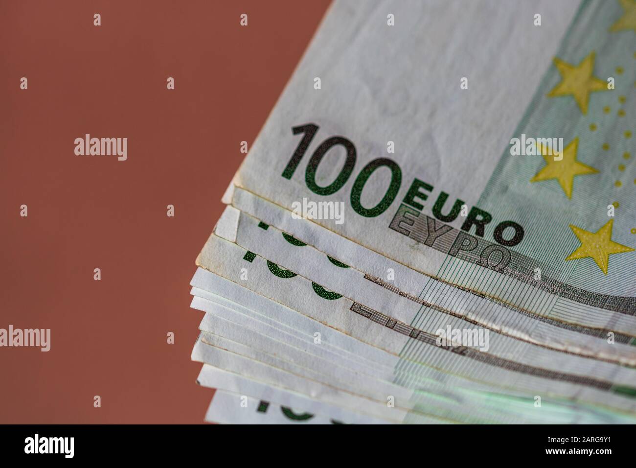 World money concept, macro detailed on a 100 Euro banknote, macro photo ...