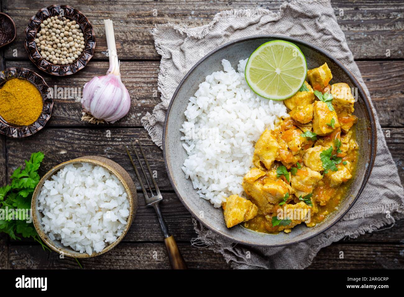 Spicy chicken cooked with curry sauce and rice, top view Stock Photo ...