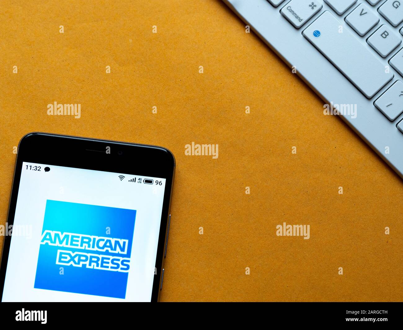 In this photo illustration an American Express logo seen displayed on a ...