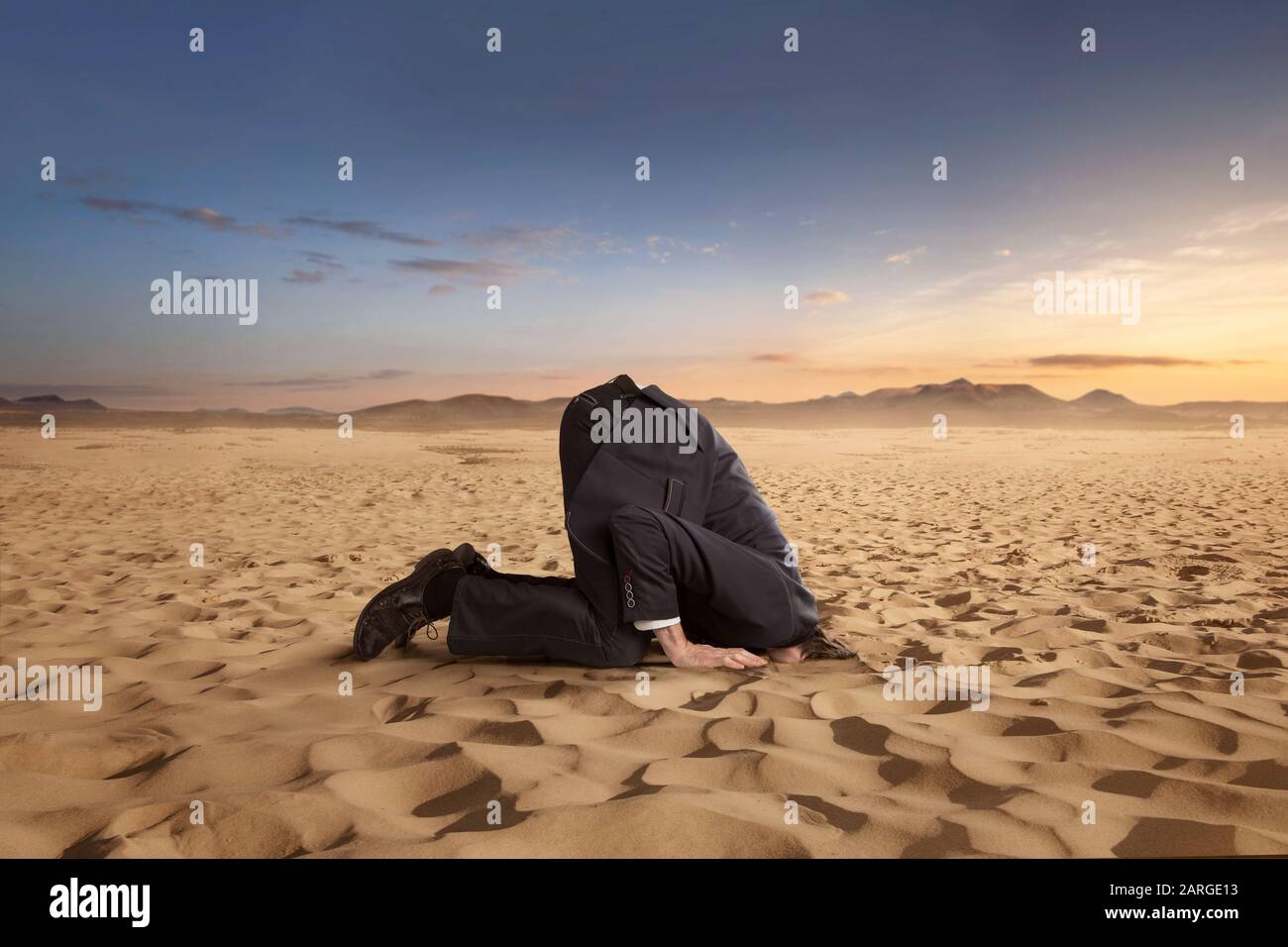 Head in sand hi-res stock photography and images - Alamy