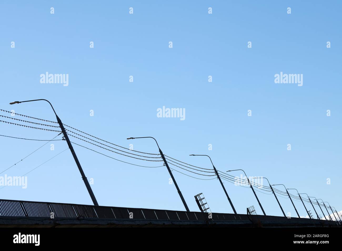 Lampposts on bridge. Road light poles, copy space. LED light post for ...