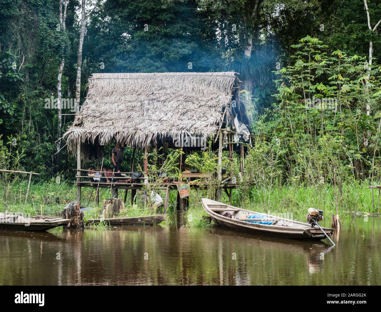A small house built on stilts in Belluda Creek, Ucayali River, Loreto ...