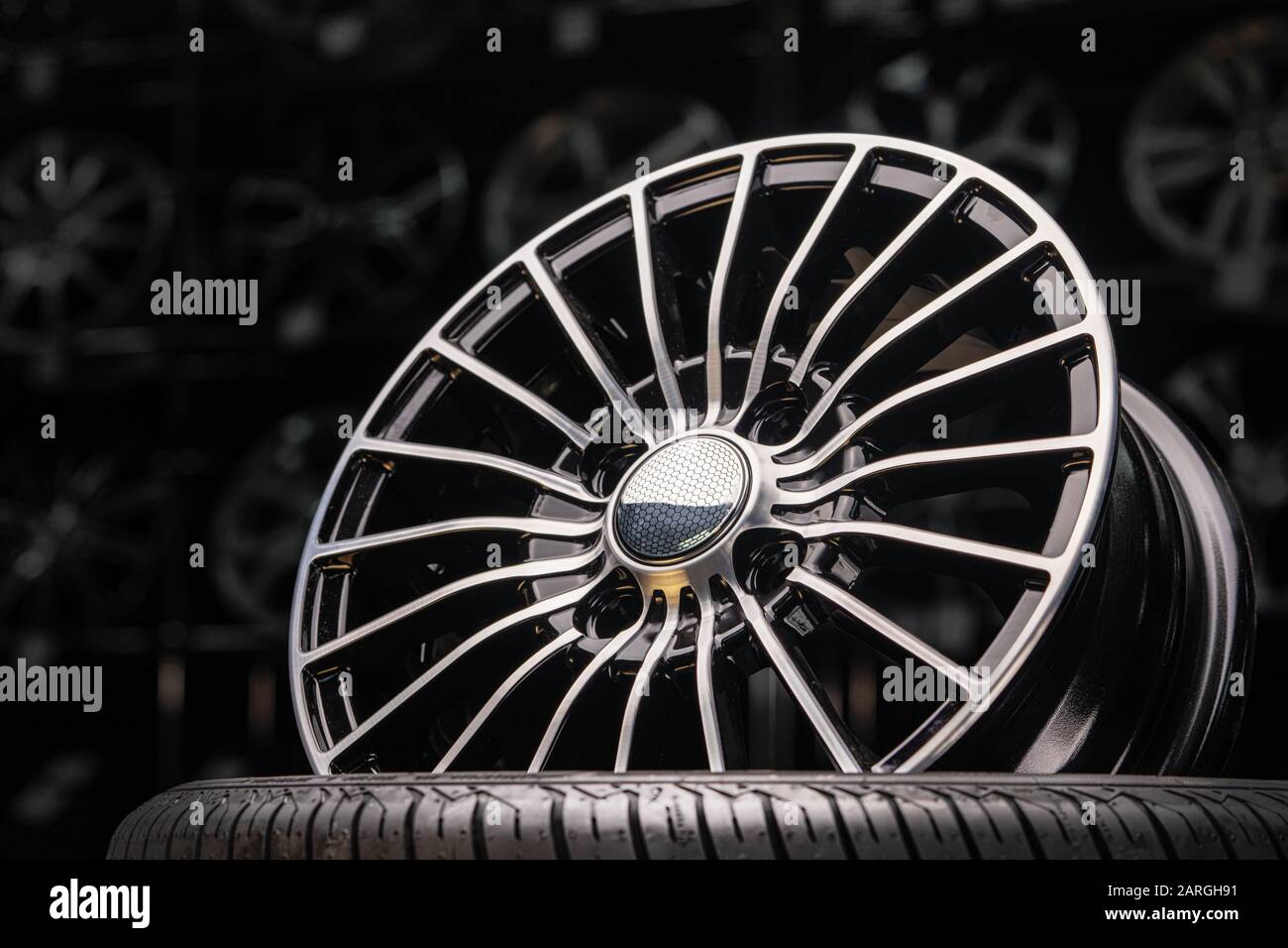 cast aluminum wheels in the store. thin spokes, beautiful black color ...