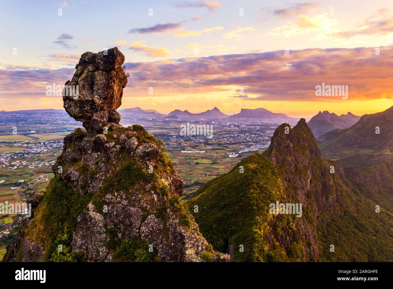 Pieter Both and Le Pouce mountain lit by the african sunset, aerial ...