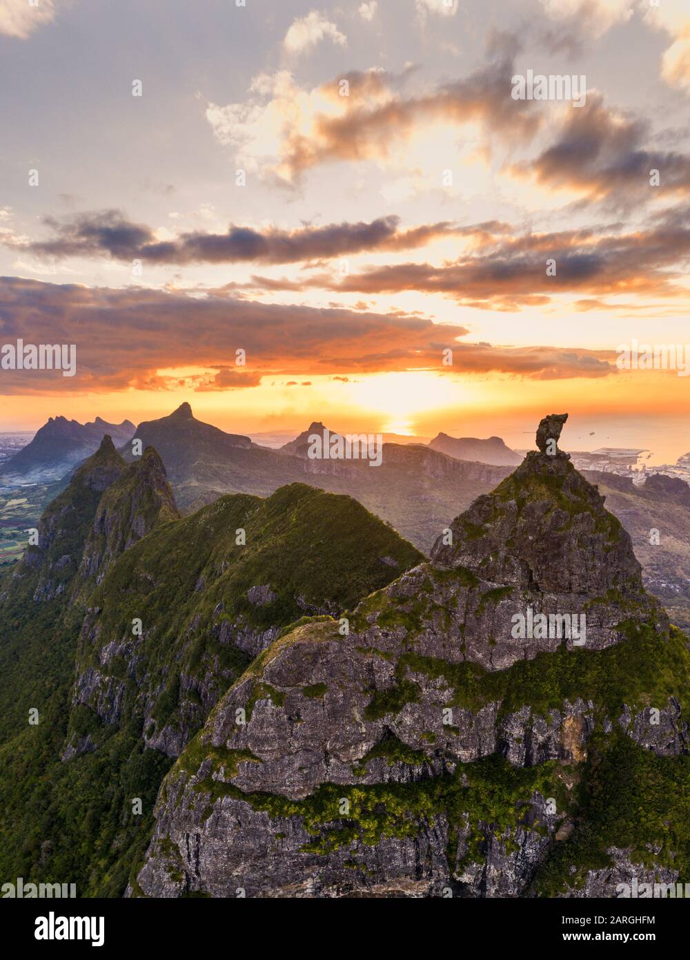 Dramatic sky at sunset over Pieter Both and Le Pouce mountain, aerial ...