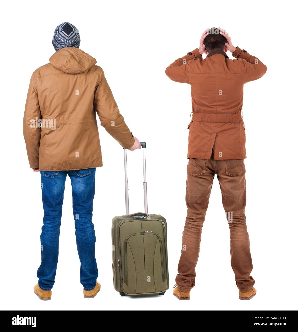 Back view of two man in winter jacket traveling with suitcas. Back view ...