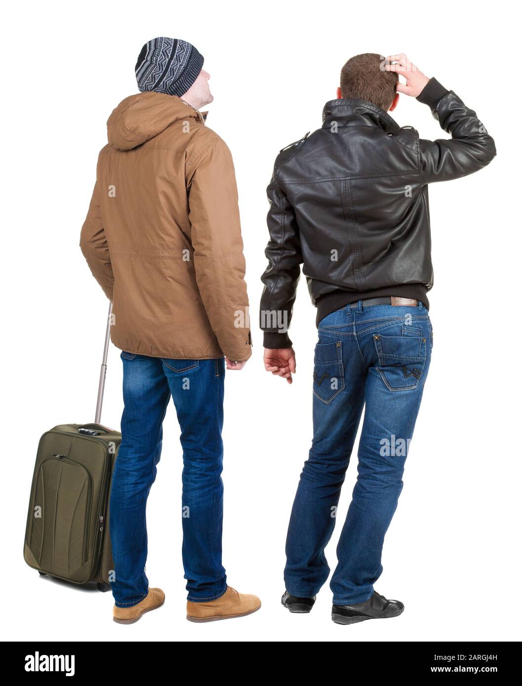 Back view of two man in winter jacket traveling with suitcas. Back view ...