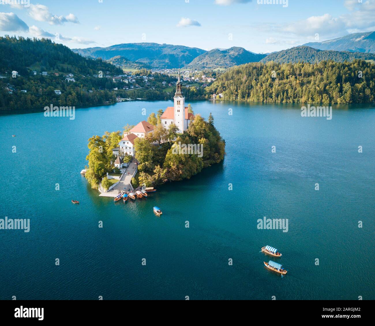 Aerial view by drone of Bled Island with the Church of the Assumption ...