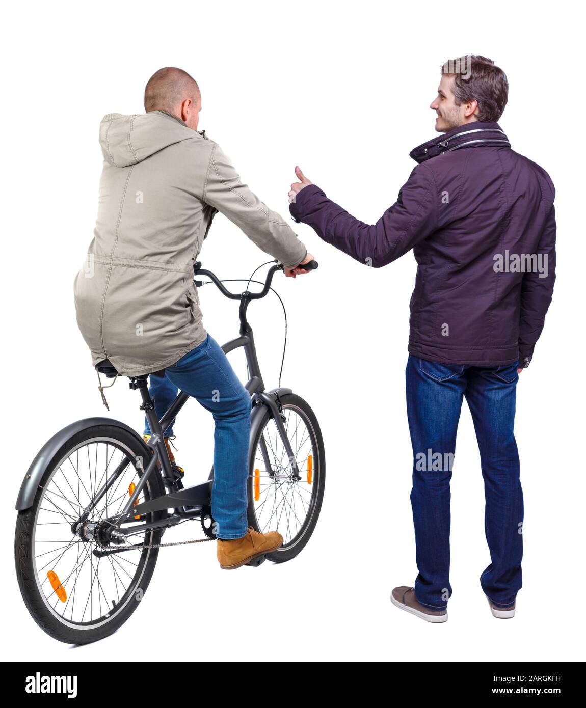 Back view of two man on a bicycle in winter jacket. Rear view people ...