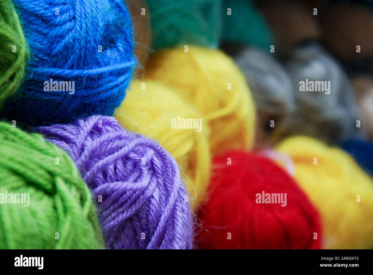 Close up of colorful yarn in hobby store Stock Photo - Alamy