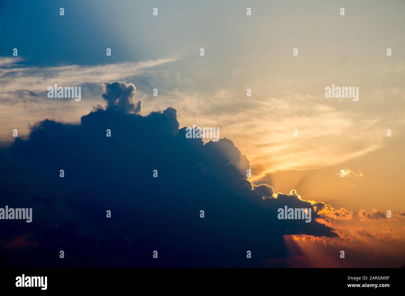 Sunset / sunrise with clouds, light rays and other atmospheric effect ...