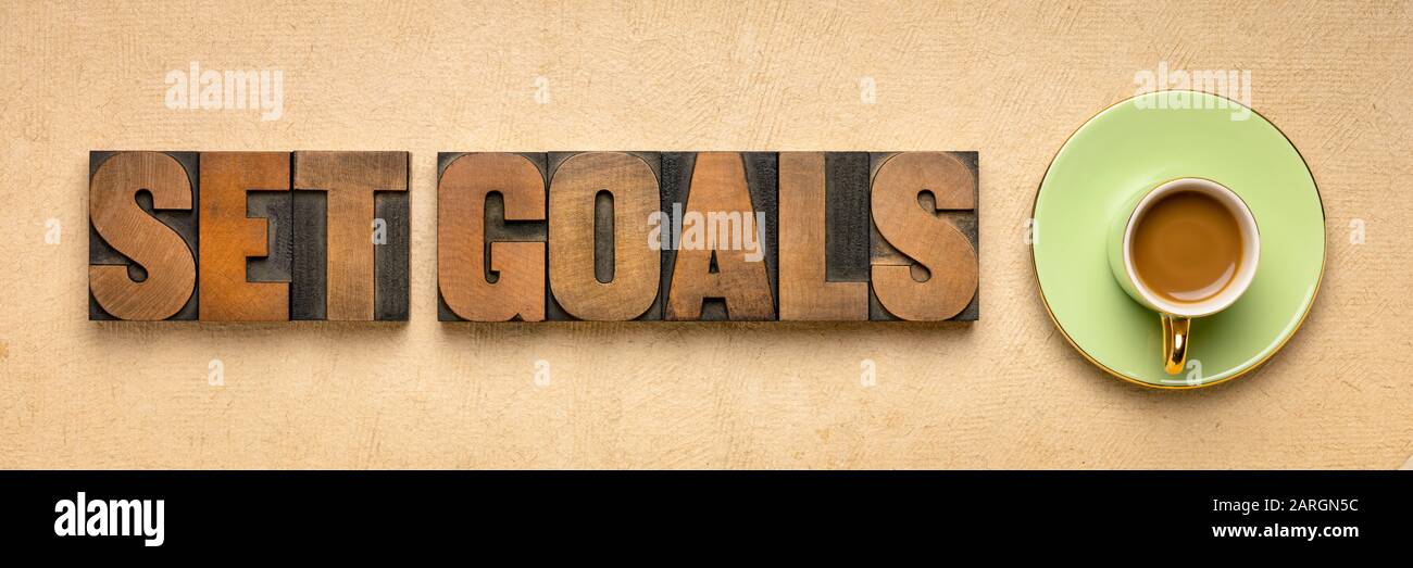 set goals banner in letterpress wood type with a cup of coffee, goal ...