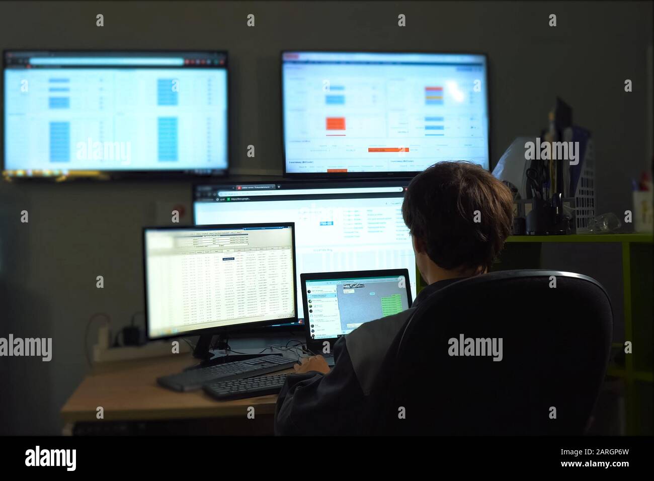 Computer hacker behind hi-res stock photography and images - Alamy