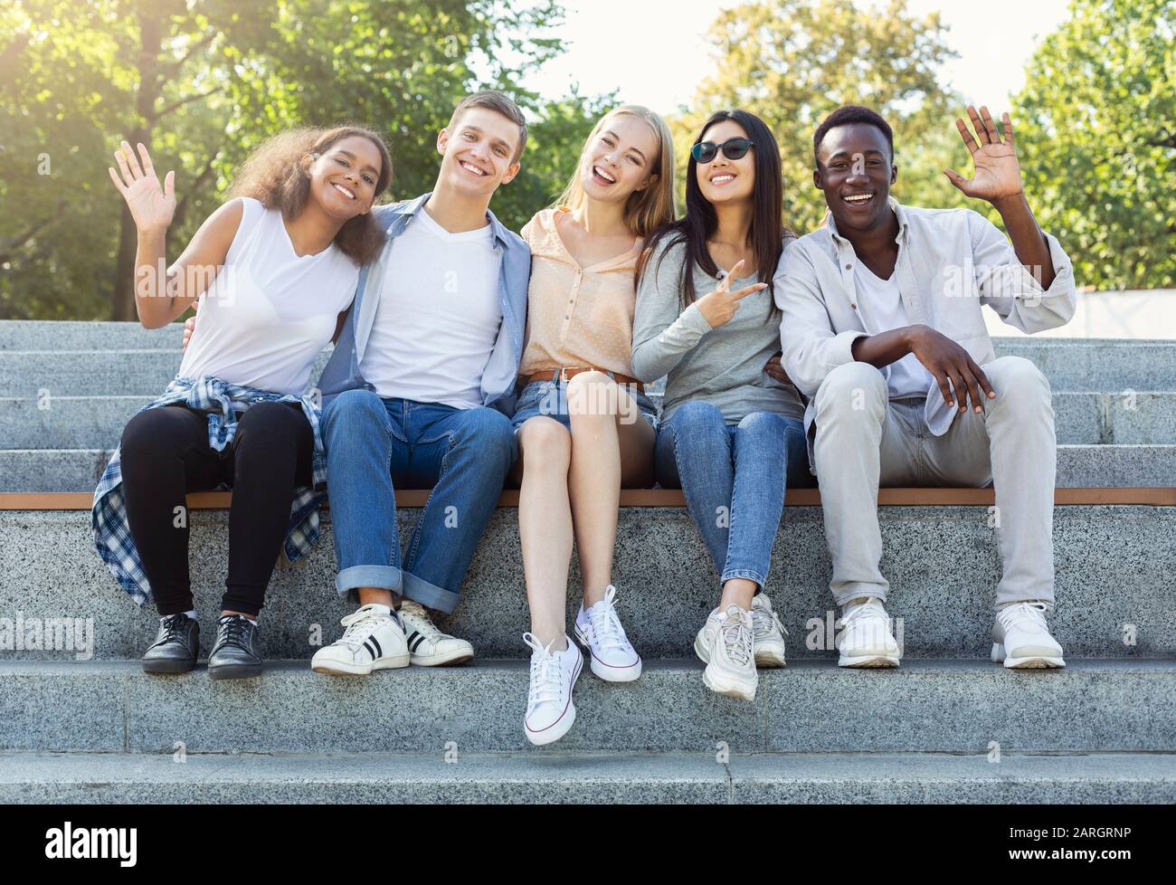 Happy friends spending time together in the city Stock Photo - Alamy
