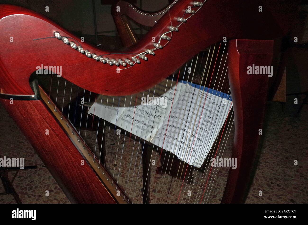 Celtic harp and music score Stock Photo - Alamy