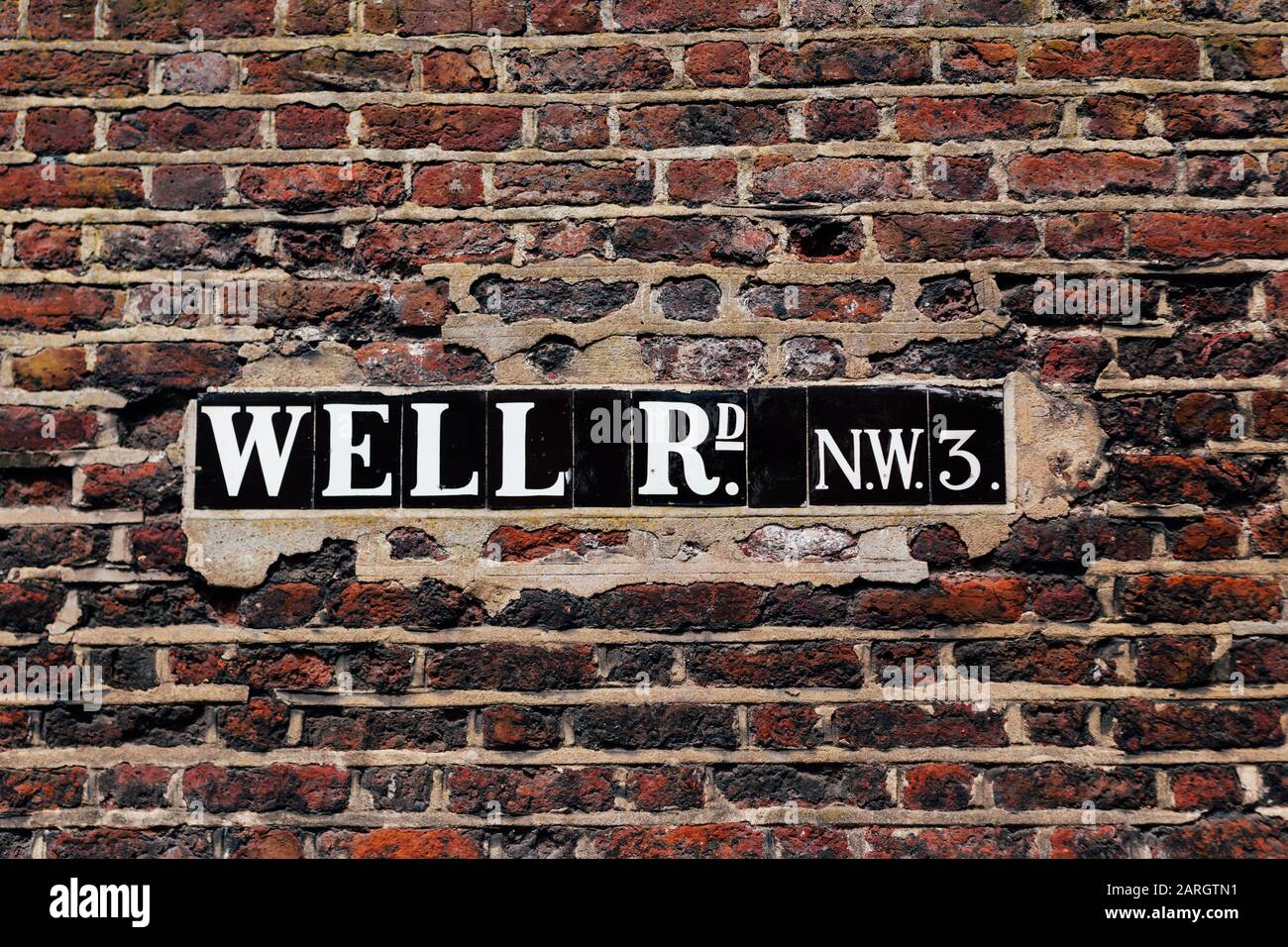 Well Road name sign, Hampstead, London. A street name sign is a type of ...