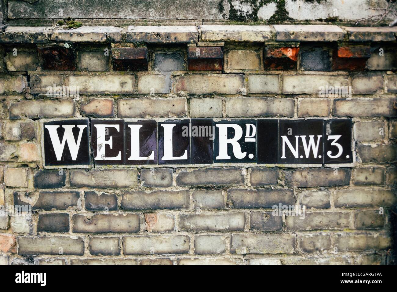 Well Road name sign, Hampstead, London. A street name sign is a type of ...