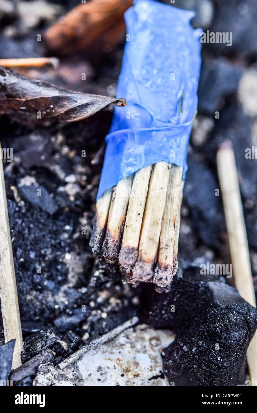 Used and burned matchstick as trash in the environment Stock Photo - Alamy
