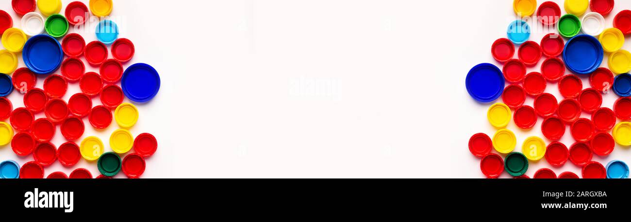 Colored plastic bottle's covers on white background, top view Stock ...