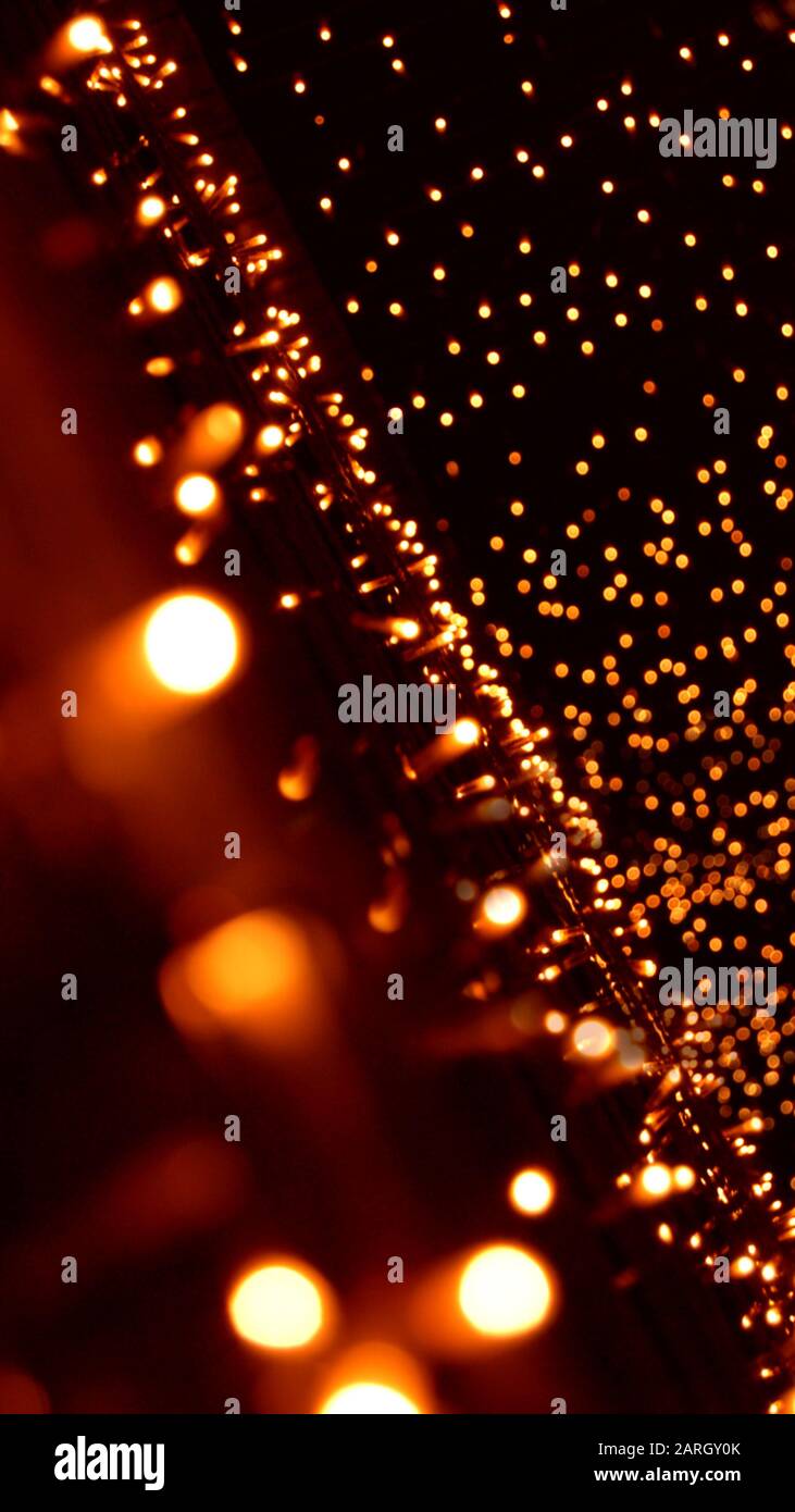 abstract background with yellow orange golden lights Stock Photo - Alamy