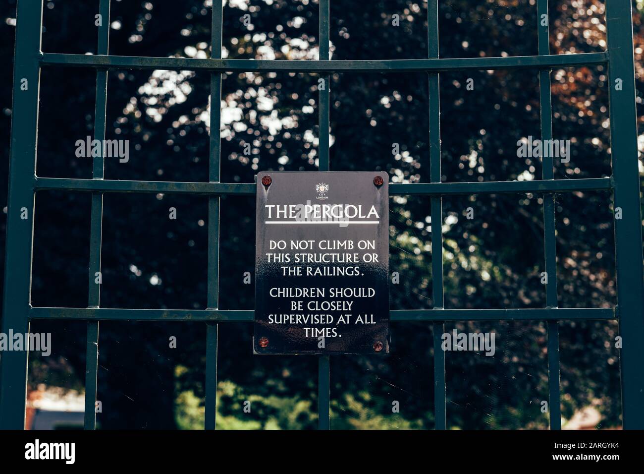 London/UK - 17/07/2019: Warning plate installed on a lattice of the ...