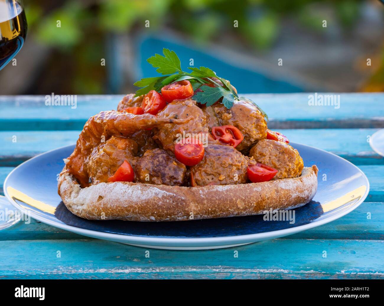 a bread plate with meatballs Stock Photo - Alamy