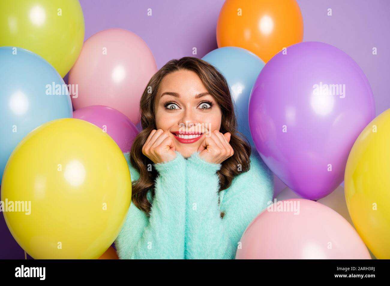 Dreams come true. Photo of pretty lady hands on cheeks surrounded many ...