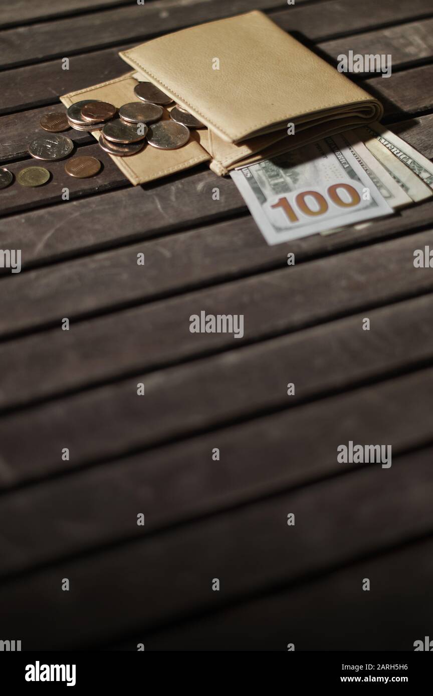 Open coin purse spilling hi-res stock photography and images - Alamy