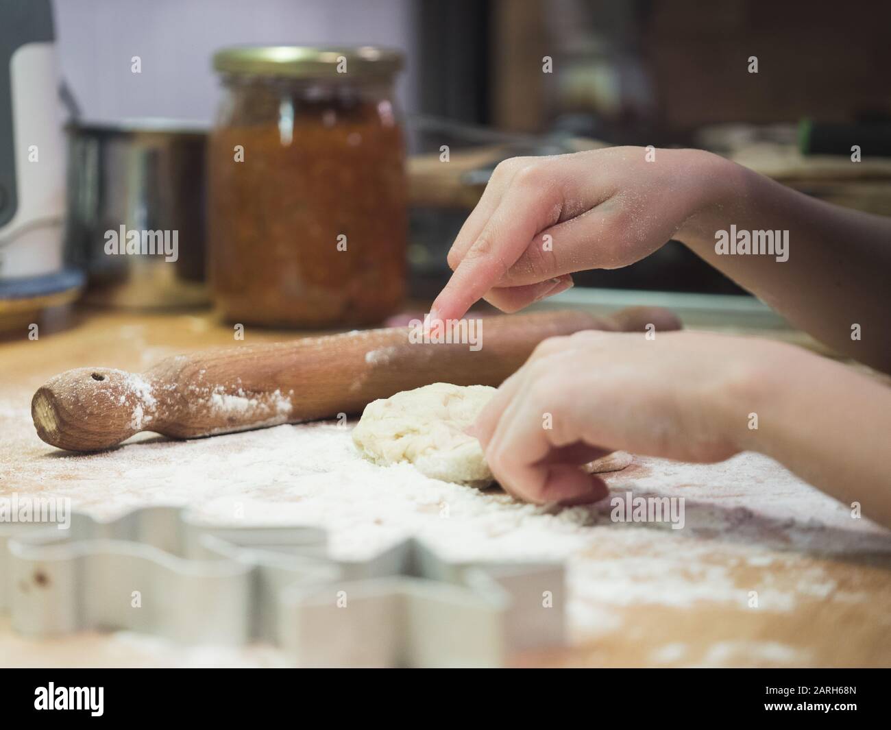 Child makes dough. Close up of hands child that make dough with rolling ... Child makes dough. Close up of hands child that make dough with rolling ...