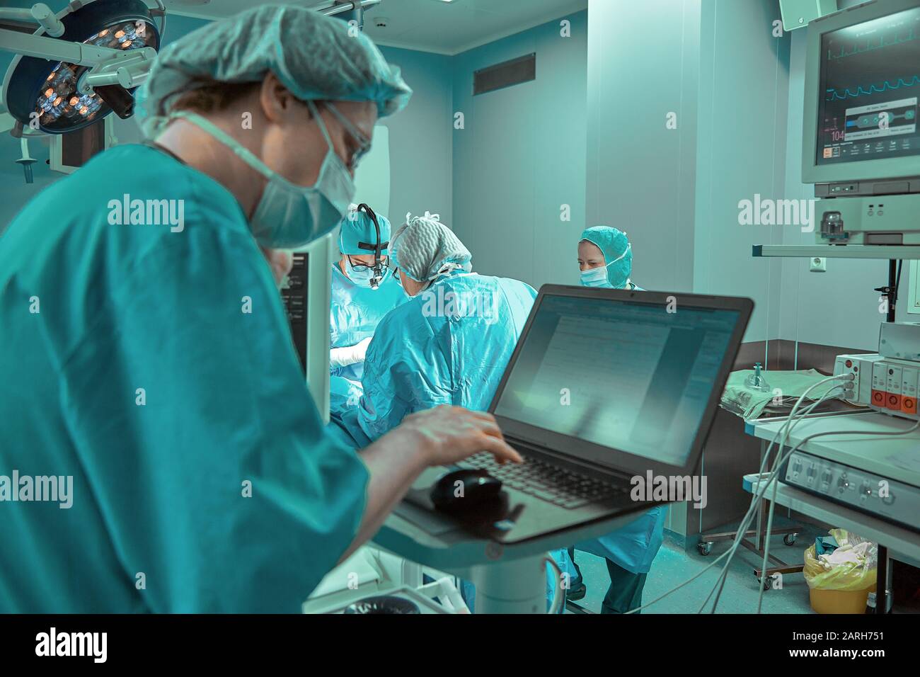 Surgeons team in the operating room, portraits close-up. modern ...