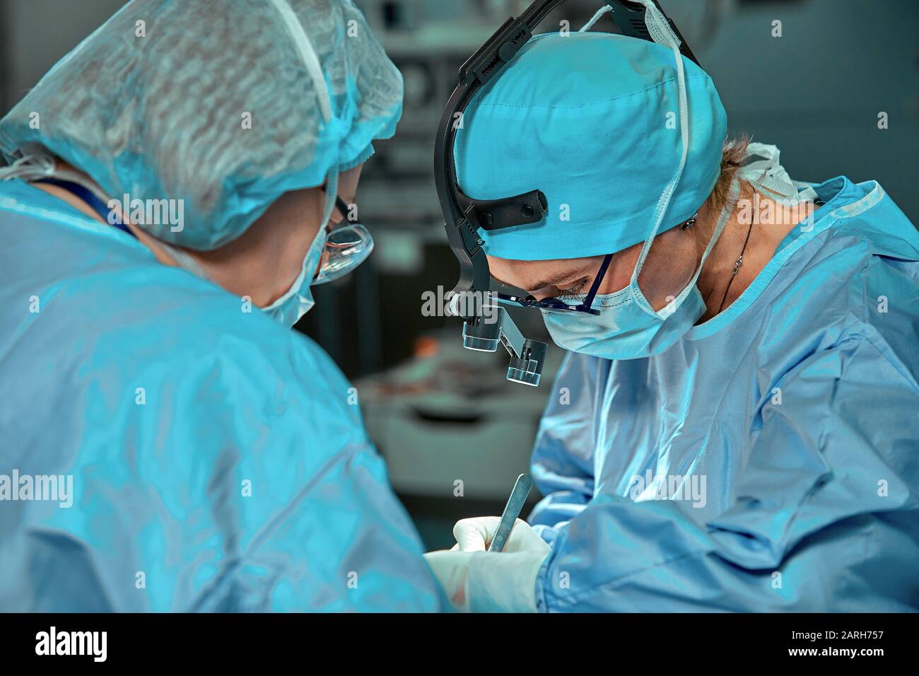 Surgeons team in the operating room, portraits close-up. modern ...