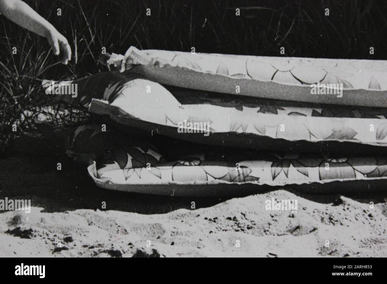 Fine seventies black and white vintage photography of a pile of beach ...