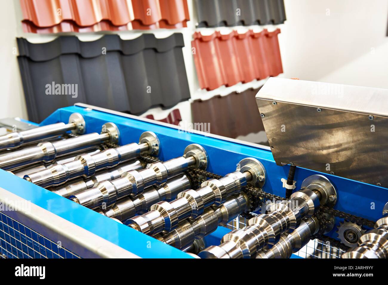 Machine for bending metal profile sheets and samples Stock Photo - Alamy