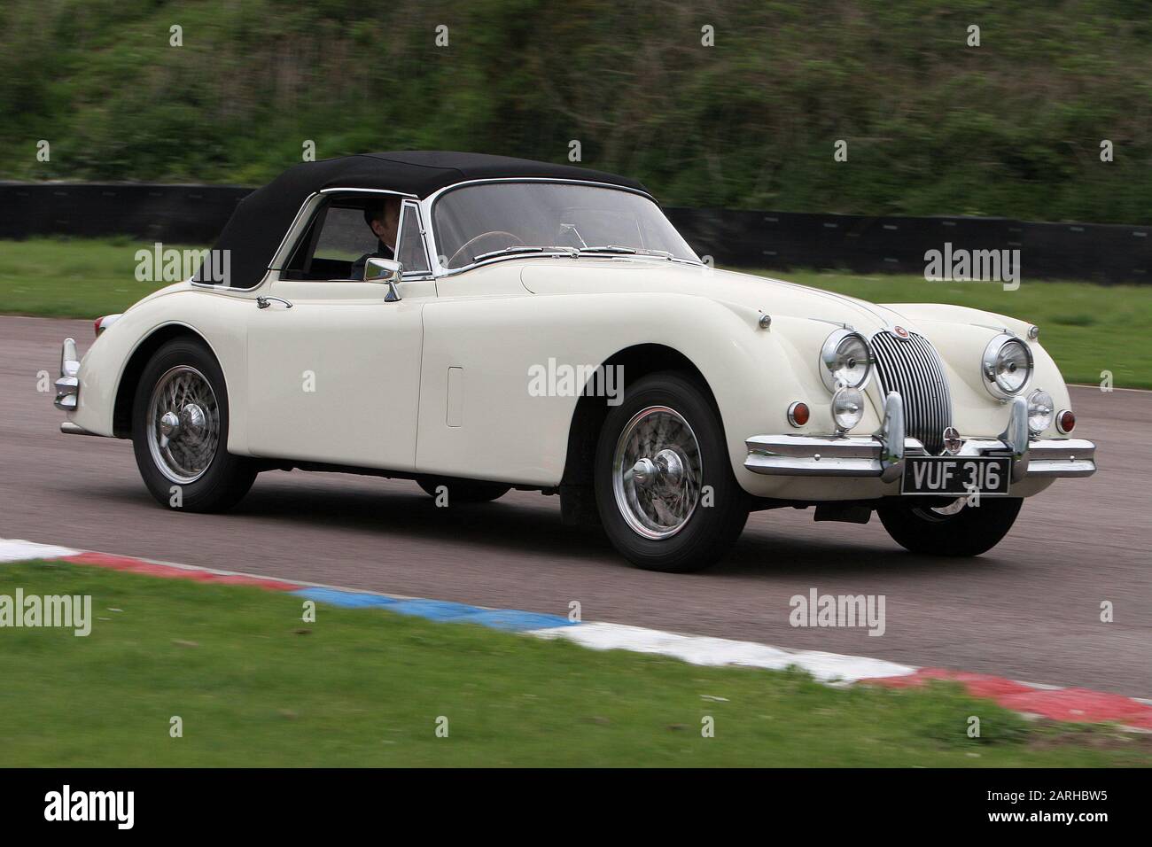 White jaguar xk150 hi-res stock photography and images - Alamy