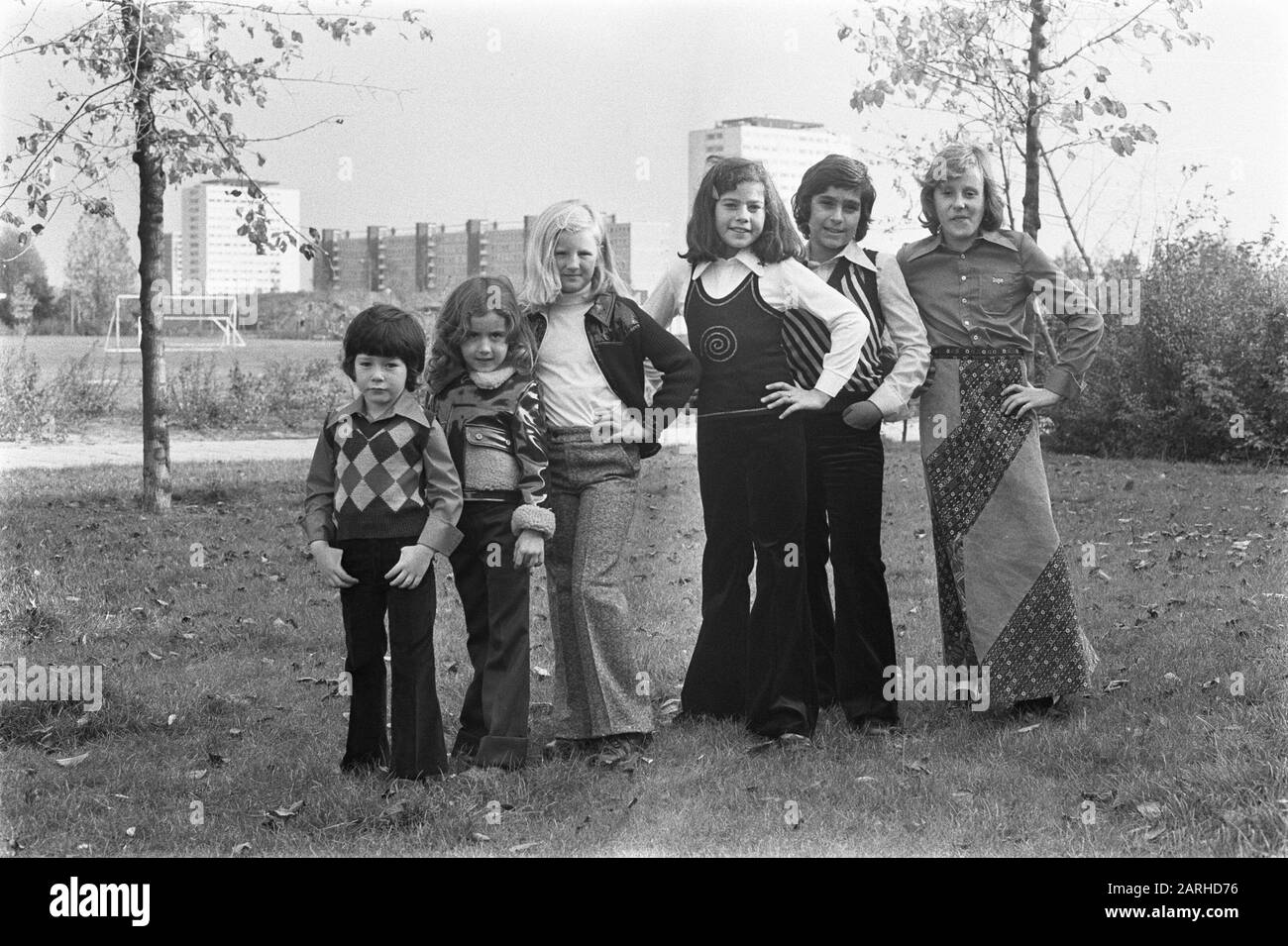 Children's fashion of the brand Mardy Six children present the clothing ...