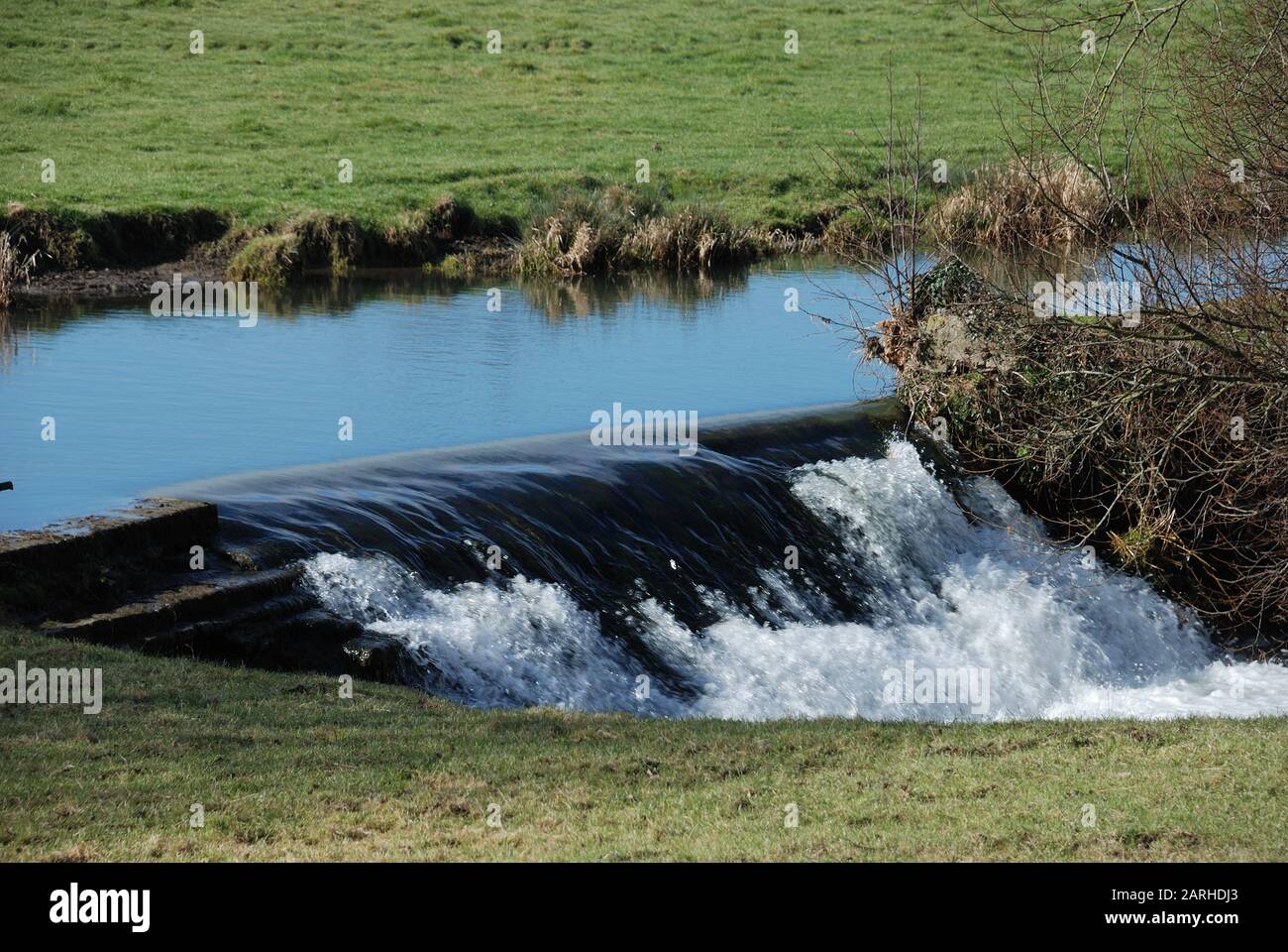 Edge of a river Stock Photo - Alamy