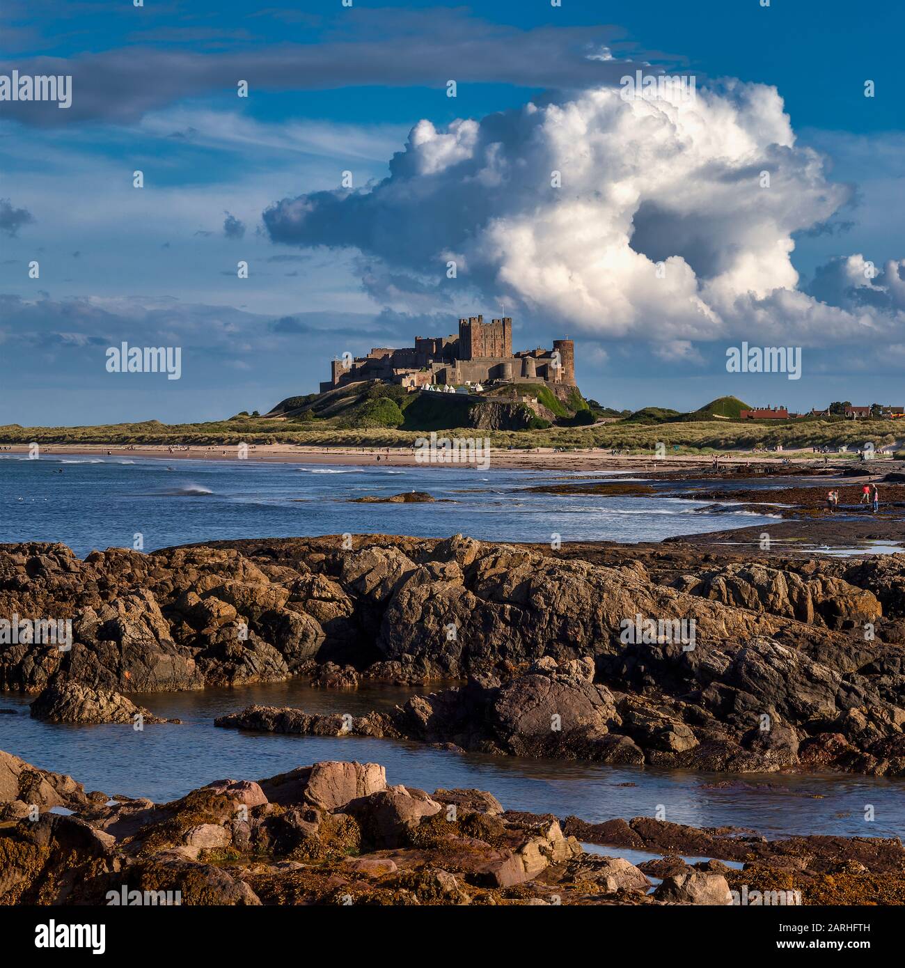 A view in Summer on Bamburgh beach looking towards Bamburgh Castle ...