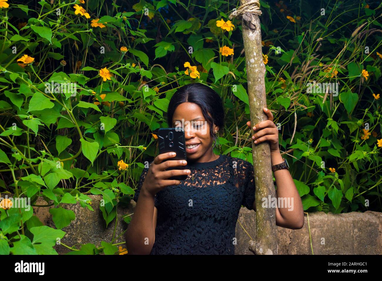 Young black africa woman using hi-res stock photography and images - Alamy