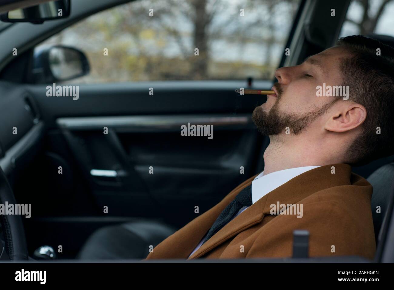 Man asleep in a car hi-res stock photography and images - Alamy