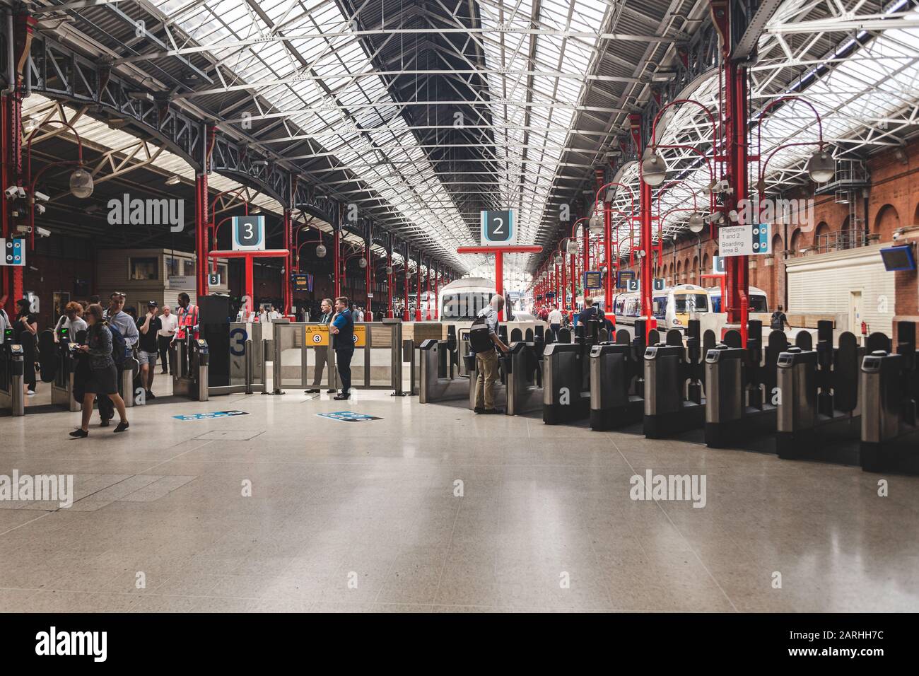 Turnstiles crowd in out hi-res stock photography and images - Alamy
