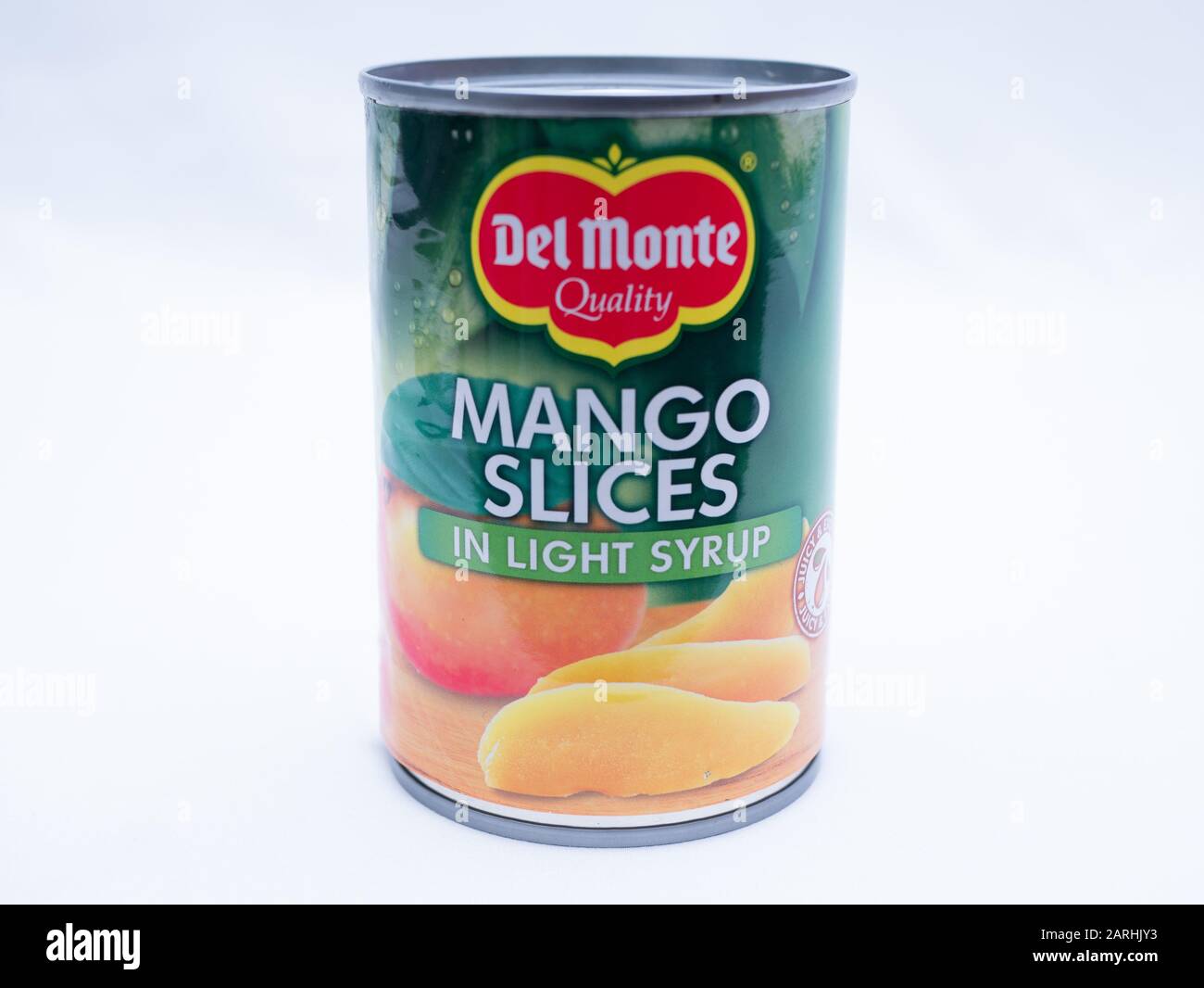 UK, Jan 2020: Del Monte mango slices in a tin can on white studio ...