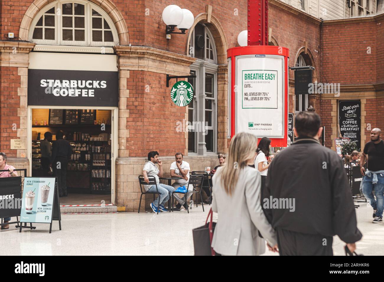London/UK - 22/07/2019: people enjoying their time in a sitting area in ...